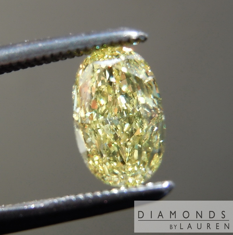 0.61ct Yellow Oval Diamond Ring